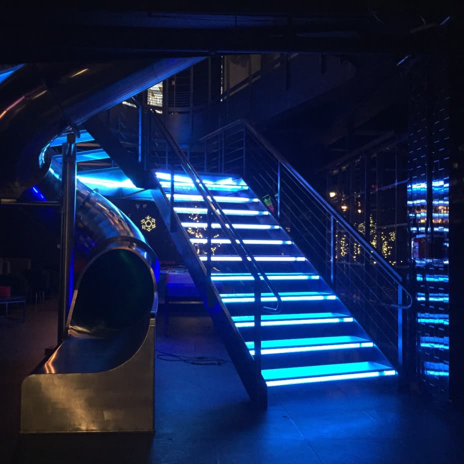 This NYC Bar Has A Giant Indoor Slide